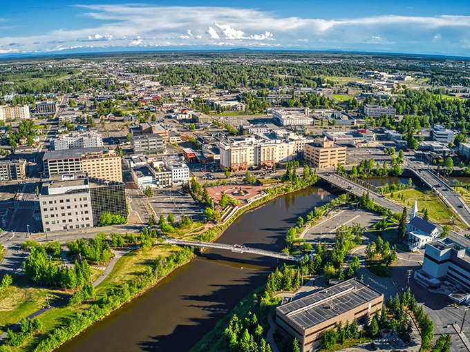 Fairbanks from above &ndash; where urban convenience meets wilderness adventure, with the Chena River winding through like nature's Main Street.
