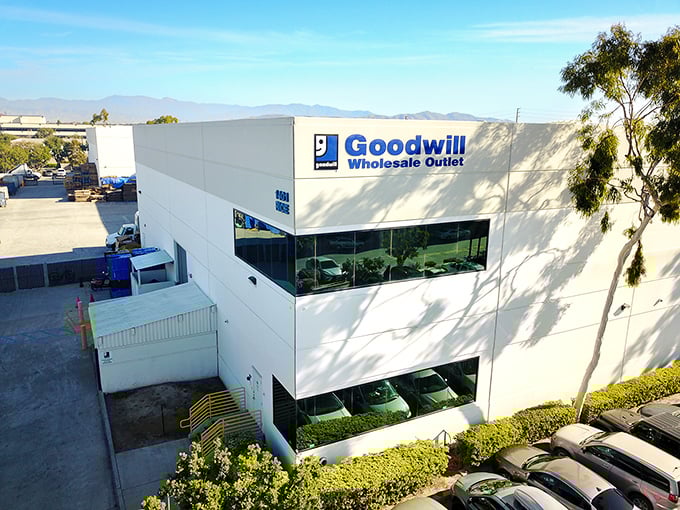 The Goodwill Wholesale Outlet stands like a treasure fortress in Oxnard. Inside those white walls, furniture dreams come true without the nightmare prices.