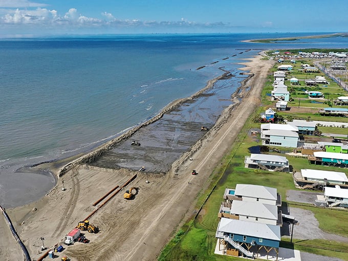 Grand Isle's beachfront homes stand tall on stilts, nature's way of saying "I'm not moving, but I'm prepared for anything!"
