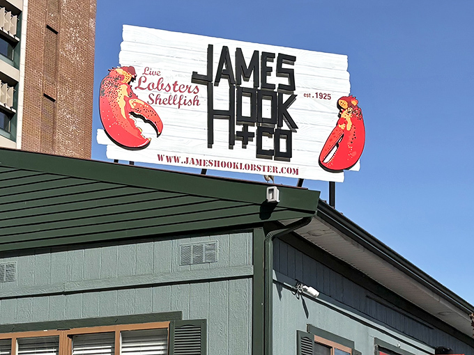 The iconic James Hook sign promises lobster nirvana. Those red claws aren't just decoration&mdash;they're a beacon for seafood lovers!