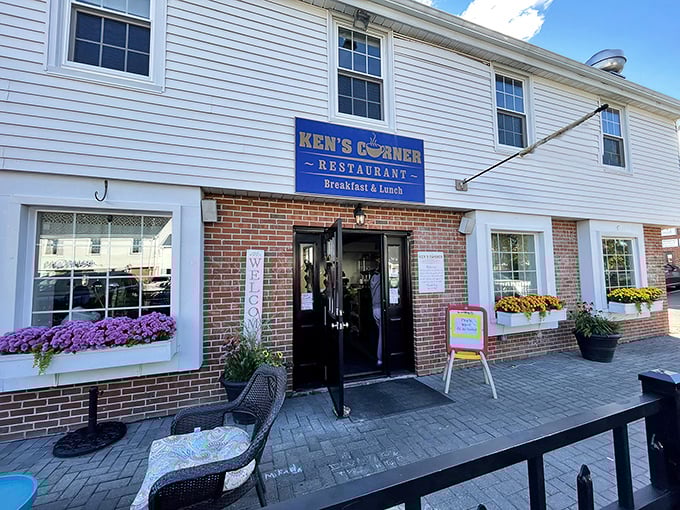 Ken's Corner's welcoming facade promises comfort food and conversation. Those flower boxes aren't just for show &ndash; they're a preview of the care inside.