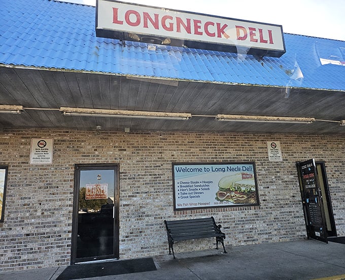 The bright blue roof of Longneck Deli stands out like a sandwich lighthouse, beckoning hungry travelers to this Millsboro gem.