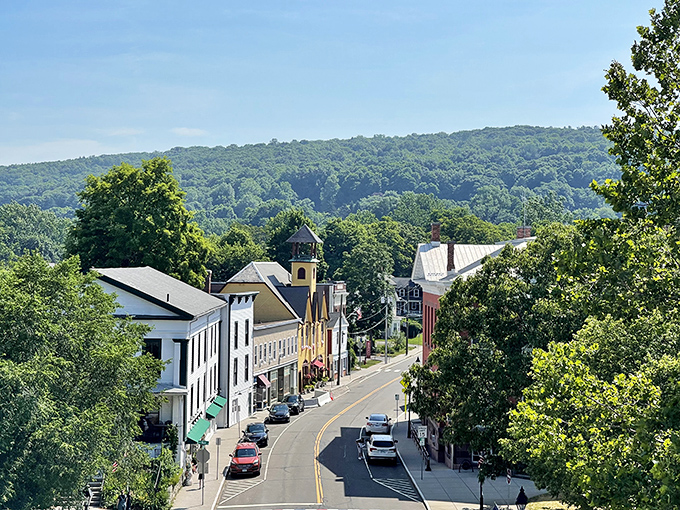 New Milford's main street could be a Stars Hollow film set with its colorful buildings and small-town charm.