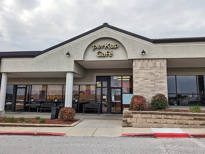The welcoming facade of PerKup Cafe invites you in like an old friend promising good coffee and even better conversation.
