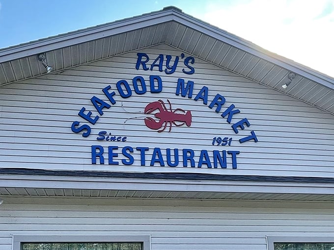 That lobster sign has been welcoming seafood lovers since 1951, promising fresh catches in landlocked Vermont.