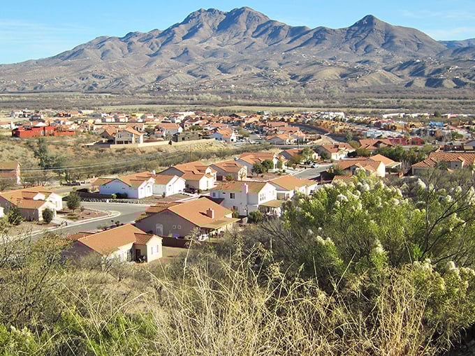Rio Rico: Where mountains stand guard over terracotta rooftops like watchful grandparents at a family reunion. Arizona's hidden residential gem.