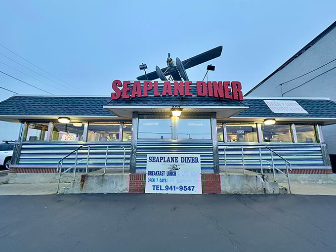 The Seaplane Diner's iconic red sign and airplane topper &ndash; where breakfast dreams take flight and calories don't count.