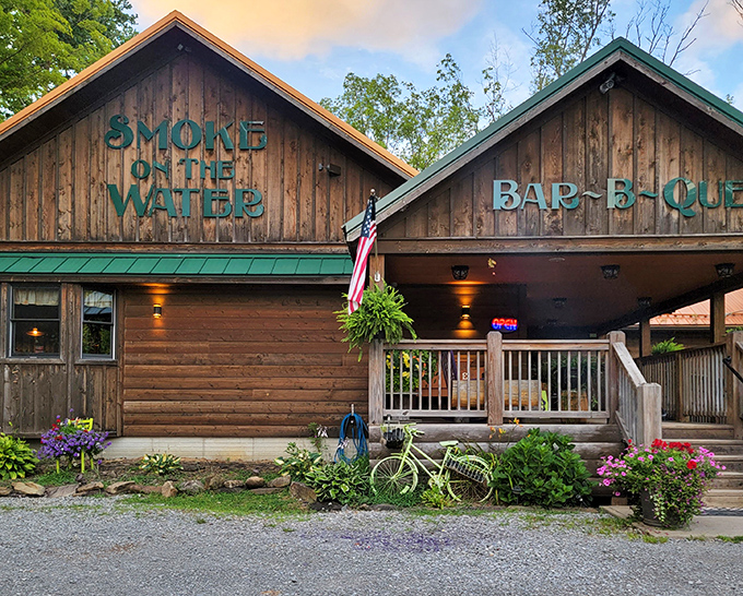Rustic wooden charm meets serious BBQ business at this cozy cabin-style restaurant where smoke signals delicious things to come.