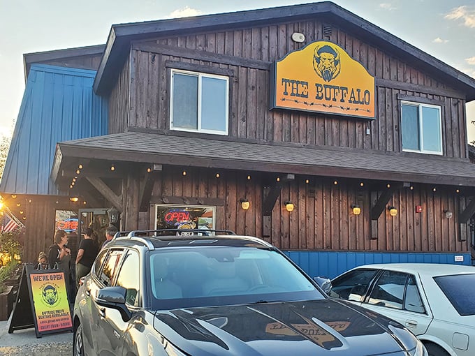 The Buffalo Bar's rustic wooden exterior promises wild flavors inside &ndash; like a frontier outpost for modern appetites.