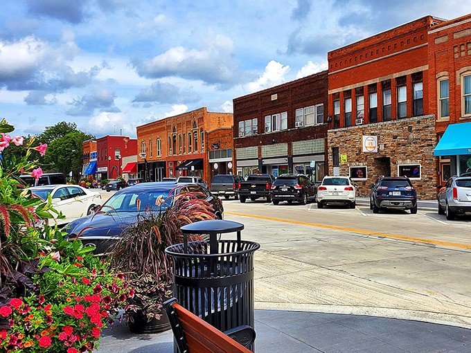 Waupaca's Main Street blooms with colorful flowers and classic brick buildings. Small-town charm without the small-town boredom!