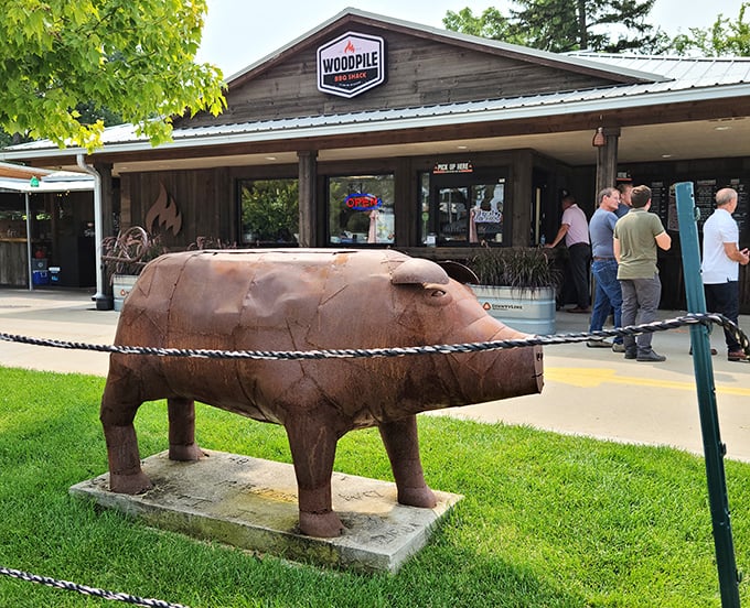 Woodpile's wooden charm and that pig statue out front &ndash; like a barbecue welcome committee that can't wait for you to taste what's smoking inside.