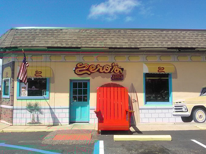 A beachside treasure with a turquoise door and giant red chair that practically screams "Come in and eat something delicious!"