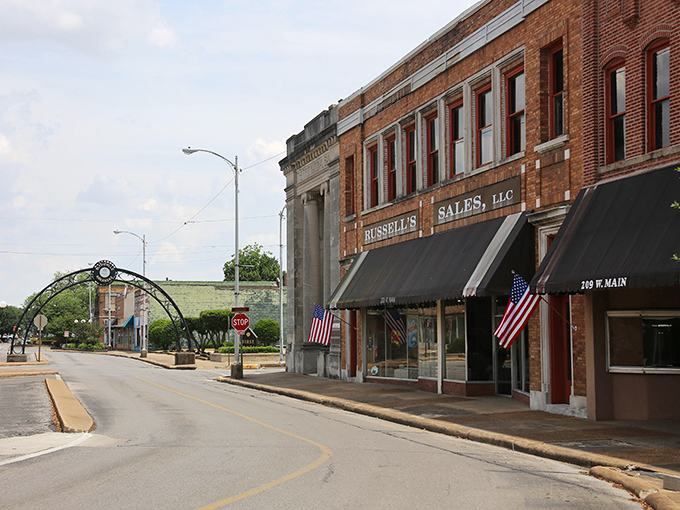 American flags flutter proudly along Blytheville's downtown, where brick storefronts tell stories of yesteryear.