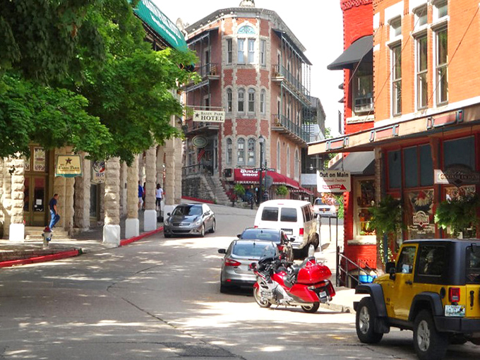 Step into a fairy tale where colorful storefronts and historic architecture create pure small-town enchantment.