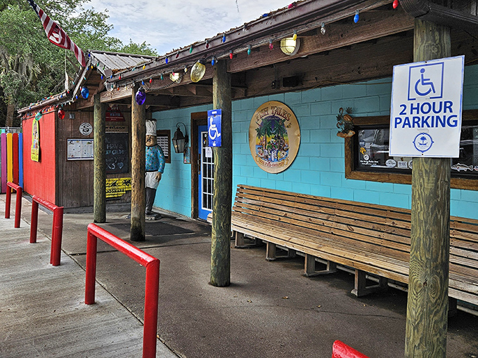 This colorful seafood shack screams "vacation mode" with its rainbow walls and laid-back coastal charm.