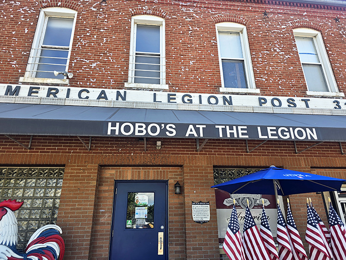 American flags flutter in welcome, hinting at the patriotic atmosphere where crispy chicken and community spirit come together perfectly.