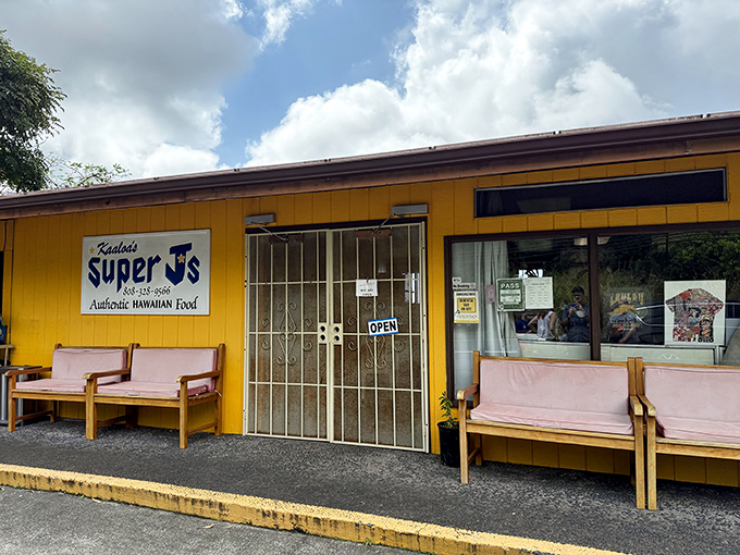 Those wooden benches outside aren't fancy, but they've supported countless happy customers waiting for Hawaii's best laulau and kalua pig.