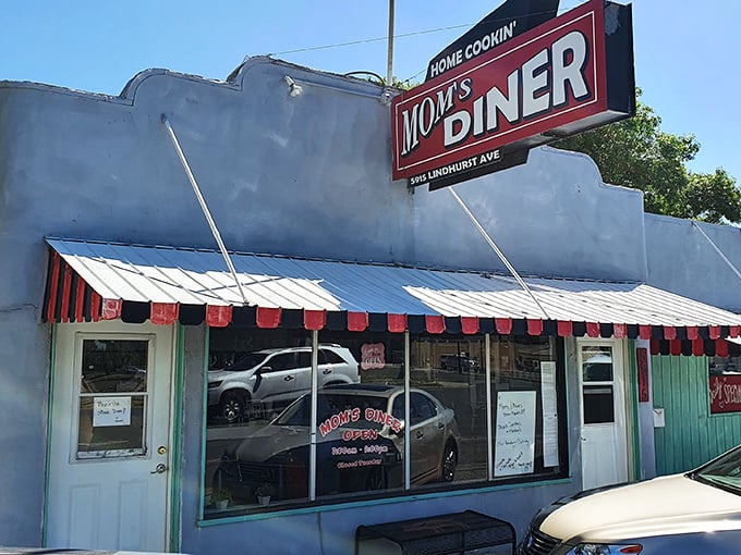 That red and black awning isn't just for show – it's like a welcome mat for your appetite.