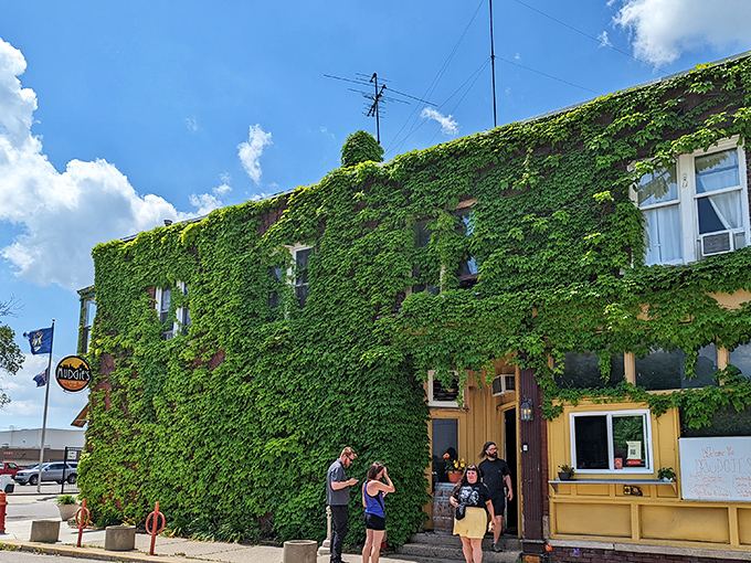 The ultimate green building! Mudgie's vine-covered walls hide Detroit's sandwich sanctuary where bread dreams come true.