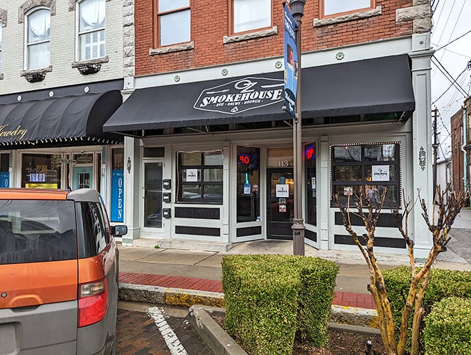 Step into BBQ paradise! OZ Smokehouse's charming storefront might look unassuming, but inside awaits meat magic that'll make your taste buds dance.
