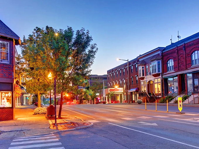 Red brick buildings stand shoulder-to-shoulder, like old friends catching up on decades of small-town gossip.