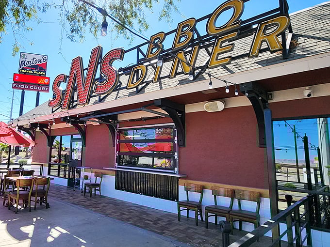 Where picnic tables meet smoky perfection. SNS BBQ Diner's open-air setup proves great barbecue needs no fancy frills.