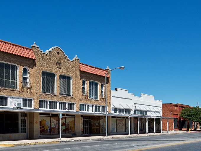 San Angelo's historic storefronts look like they're waiting for a Western movie shoot to begin. Affordable living with character to spare! Photo credit: <a href="https://flickr.com/photos/dangrdave/" target="_blank" rel="noopener noreferrer">Dave Matthews</a>