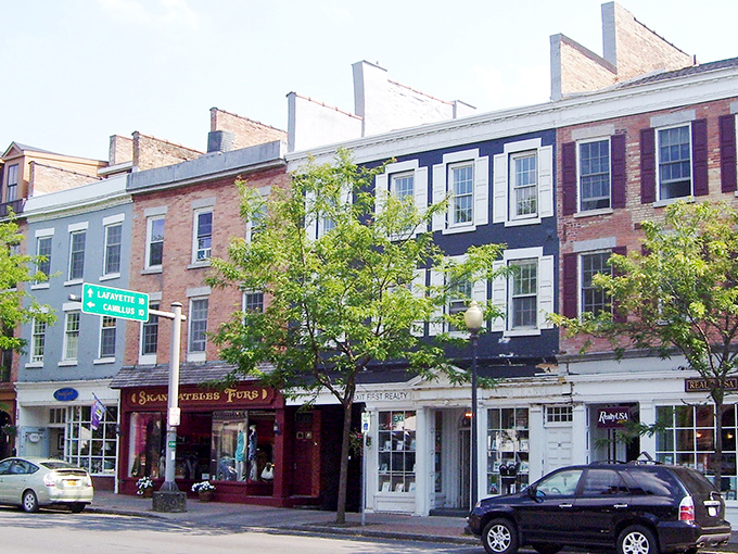 Historic row houses with colorful facades line this walkable Finger Lakes town, inviting leisurely afternoon strolls.