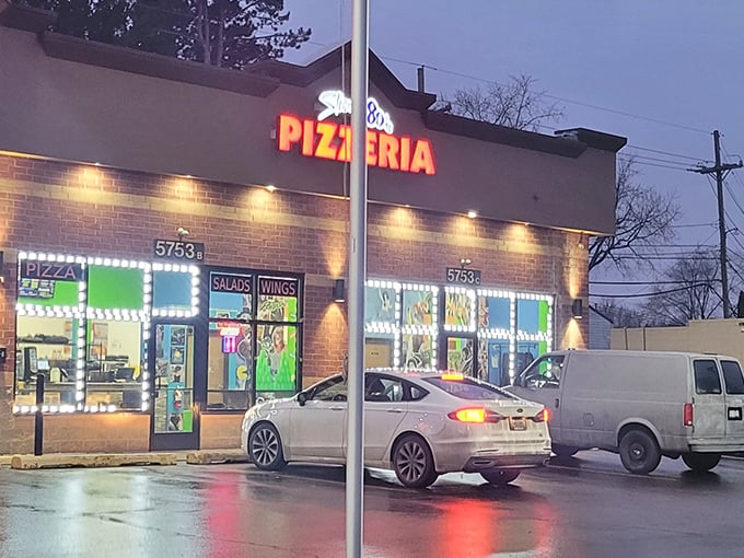 When the neon lights up at night, Slice of the 80s transforms into a pizza paradise that would make Marty McFly feel right at home.