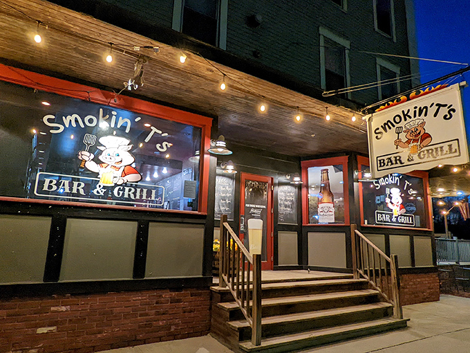 Night falls but the BBQ beckons! Smokin T's glowing storefront is like a lighthouse for the hungry and sauce-deprived.