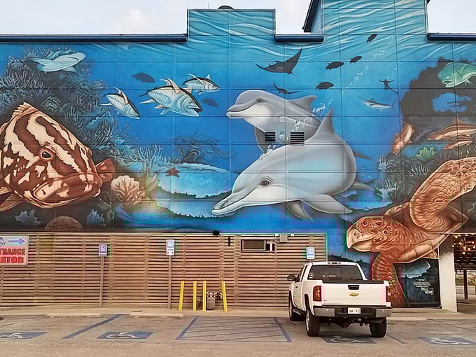 Those dolphins on the building aren't just for show—they're practically pointing you toward seafood paradise.