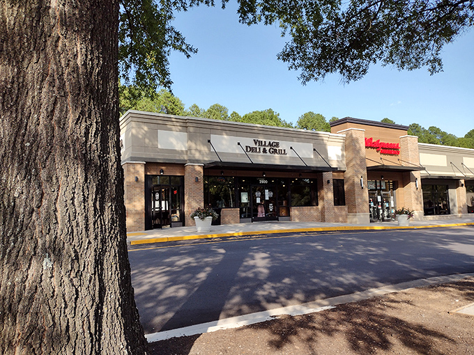 Nestled between trees and neighboring shops, this brick-faced sandwich haven promises comfort food that hugs your soul.
