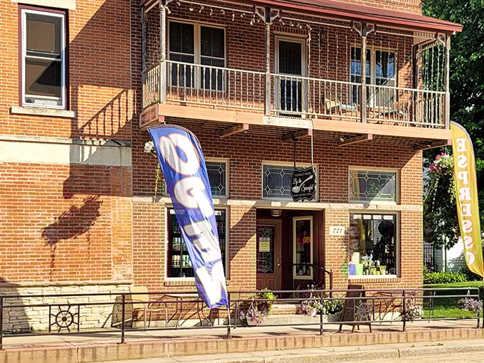 By The Spoonful offers a charming brick exterior with a welcoming porch that practically whispers, "Come in and stay awhile."