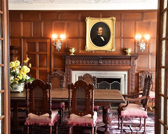 This dining room doesn't just serve meals&mdash;it serves history. The rich wood paneling and ornate fireplace create the perfect backdrop for imagining the conversations of decades past.