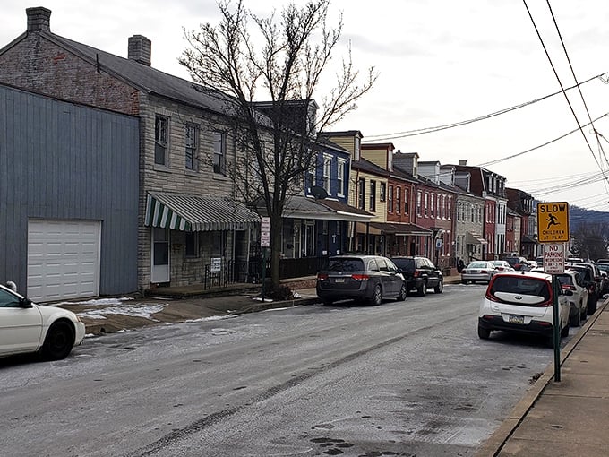 Winter reveals the true character of Marietta's colorful row houses, standing shoulder-to-shoulder like old friends who've weathered many storms together.
