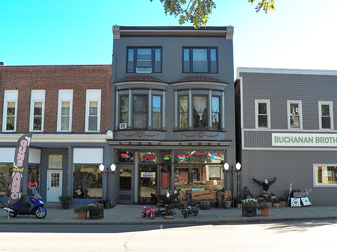 These colorful storefronts aren't just buildings—they're time machines disguised as businesses, each with stories etched in their brickwork.