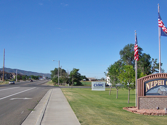 Welcome to Nephi! Where the mountains say "majestic" and the town sign says "we're glad you finally noticed us."