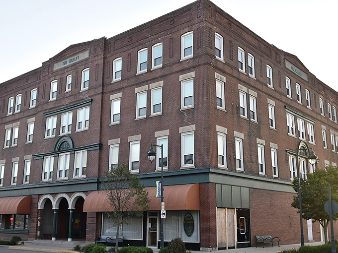 The stately Stanley Building anchors downtown with dignified brick presence, housing apartments where fixed incomes find breathing room.