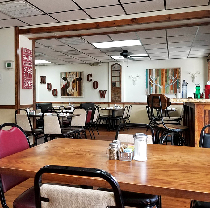 The dining room's "MOO COW" wall art perfectly captures this place's unpretentious charm&mdash;where comfort trumps trendiness and breakfast reigns supreme.