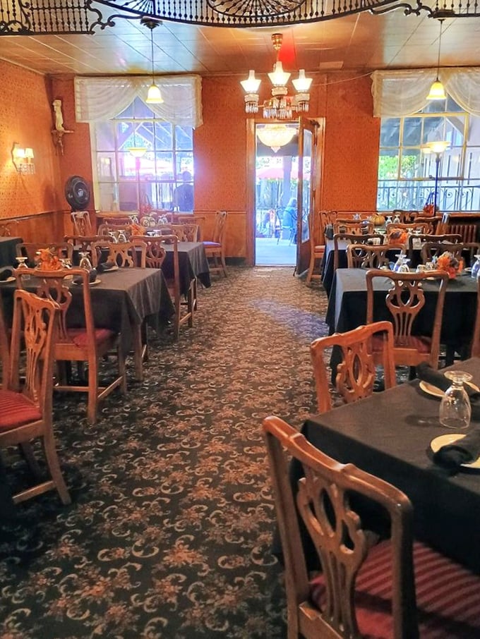 Step inside and the warm amber walls, ornate ceiling, and classic wooden chairs whisper stories of countless family celebrations.