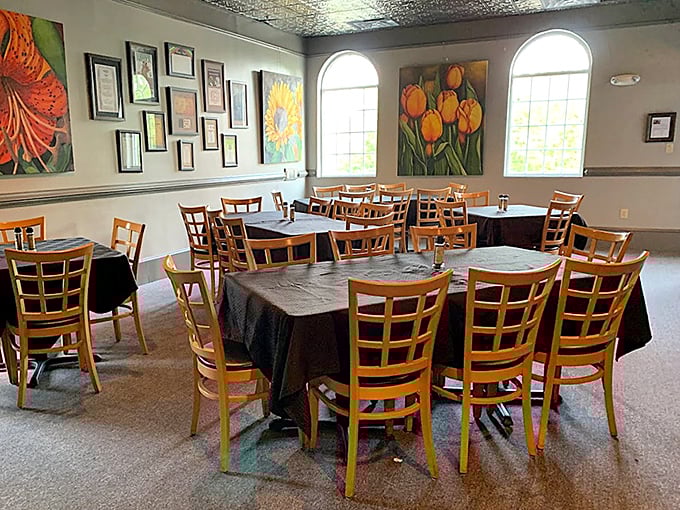 Inside, wooden chairs and black tablecloths create that perfect "special but comfortable" vibe, while local artwork adds splashes of color to conversations.