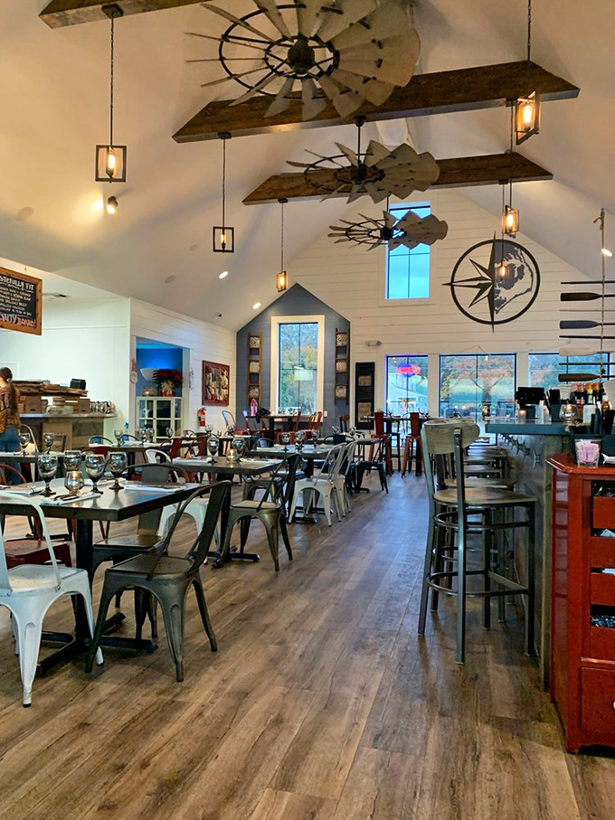 Soaring ceilings adorned with windmill-inspired fixtures create an airy, maritime atmosphere that feels both upscale and utterly relaxed&mdash;like wearing boat shoes with a blazer.