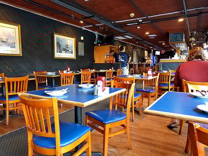 Inside, wooden tables and blue accents create that perfect "you're definitely in New England" atmosphere. Like dining in the cozy cabin of a well-loved schooner.