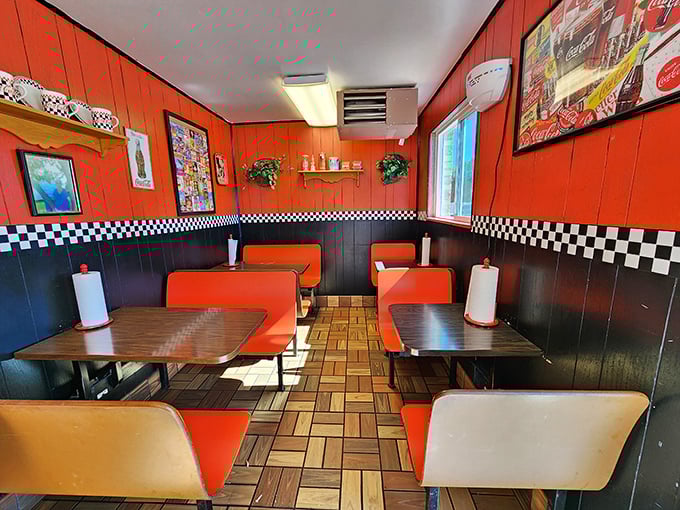 Step inside and the vibrant orange walls practically announce: "Good times ahead!" This isn't minimalist design; it's maximalist comfort.