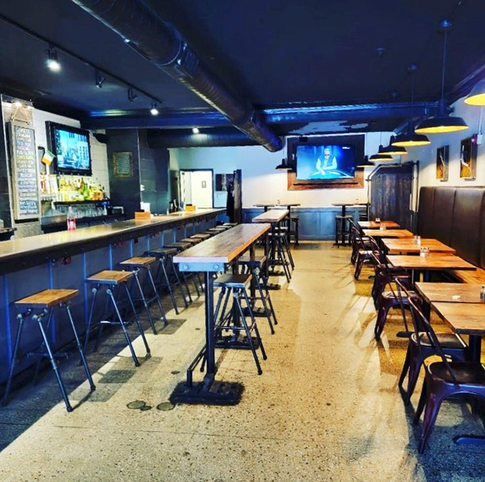 Industrial-chic meets cozy comfort in this thoughtfully designed space where conversations flow as smoothly as the draft beers.