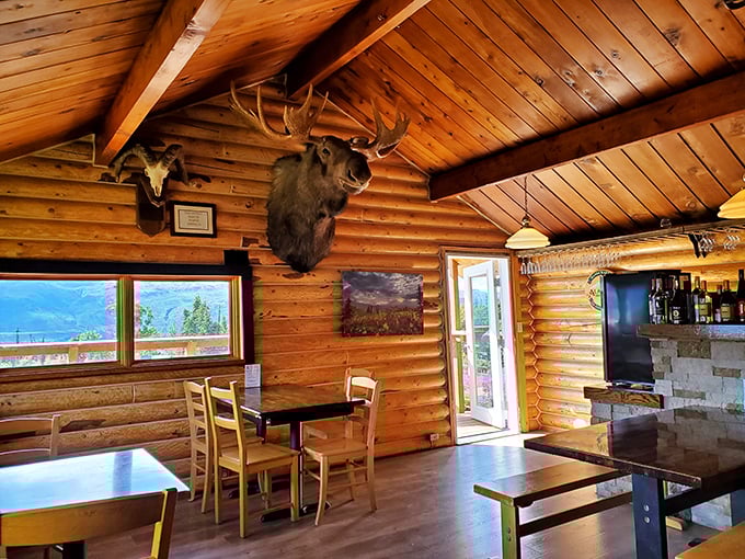 Inside, warm wood and mounted wildlife create Alaska's coziest dining room. That moose isn't judging your breakfast choices&mdash;he's envious.