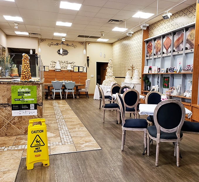 The interior blends French sophistication with Middle Eastern warmth&mdash;those elegant chairs aren't just for show, they're inviting you to linger over coffee and conversation.