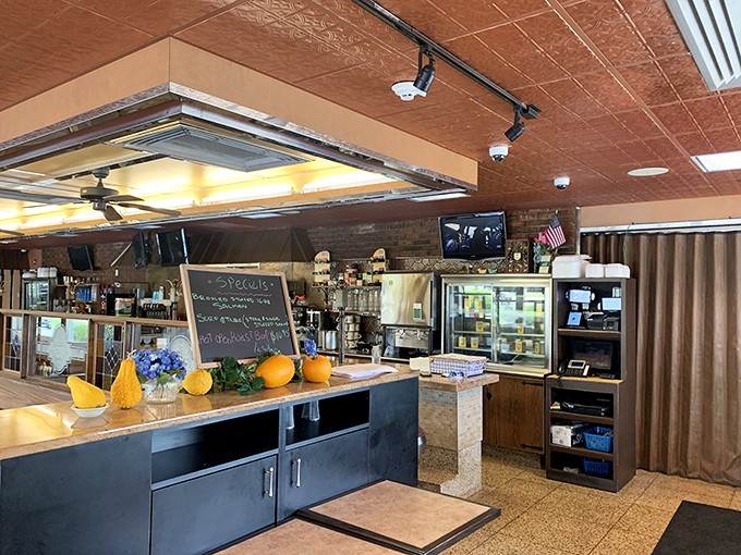 Inside, copper ceiling tiles and fresh fruit at the counter create that perfect balance of classic diner comfort with modern touches.
