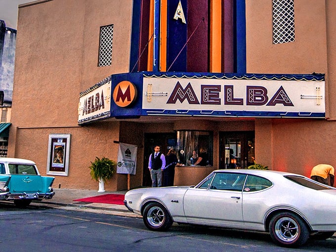 The Melba Theater stands as a time capsule of entertainment, where classic cars still park out front and movie tickets won't require a second mortgage.