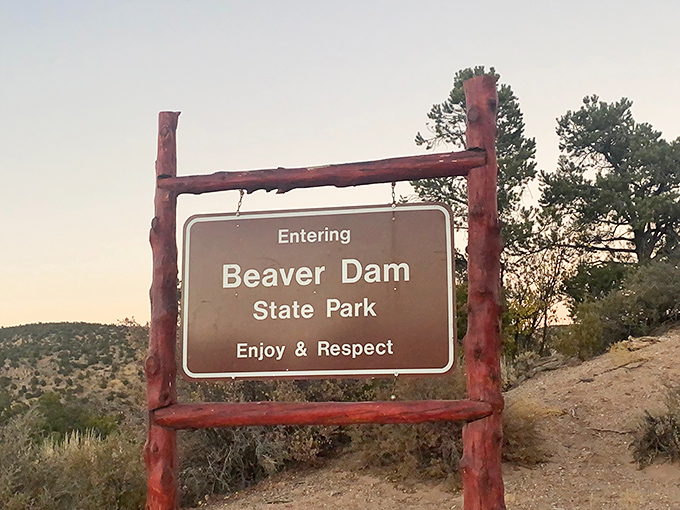 "Enjoy & Respect" – two perfect words for this wilderness sanctuary. This rustic sign marks the threshold between ordinary life and extraordinary adventure.